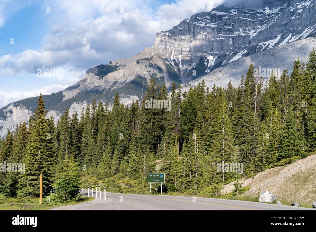 Stunning mountains surround the road leading to Two Jack Lake in Banff ...