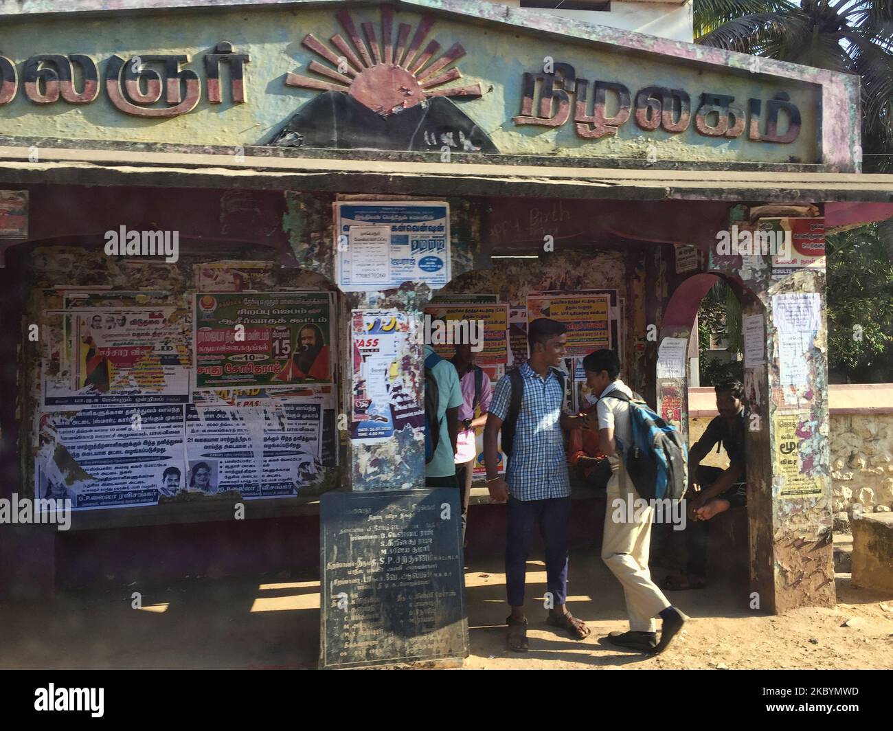Children wait at a bus stand in Vilavancode, Kanyakumari District ...