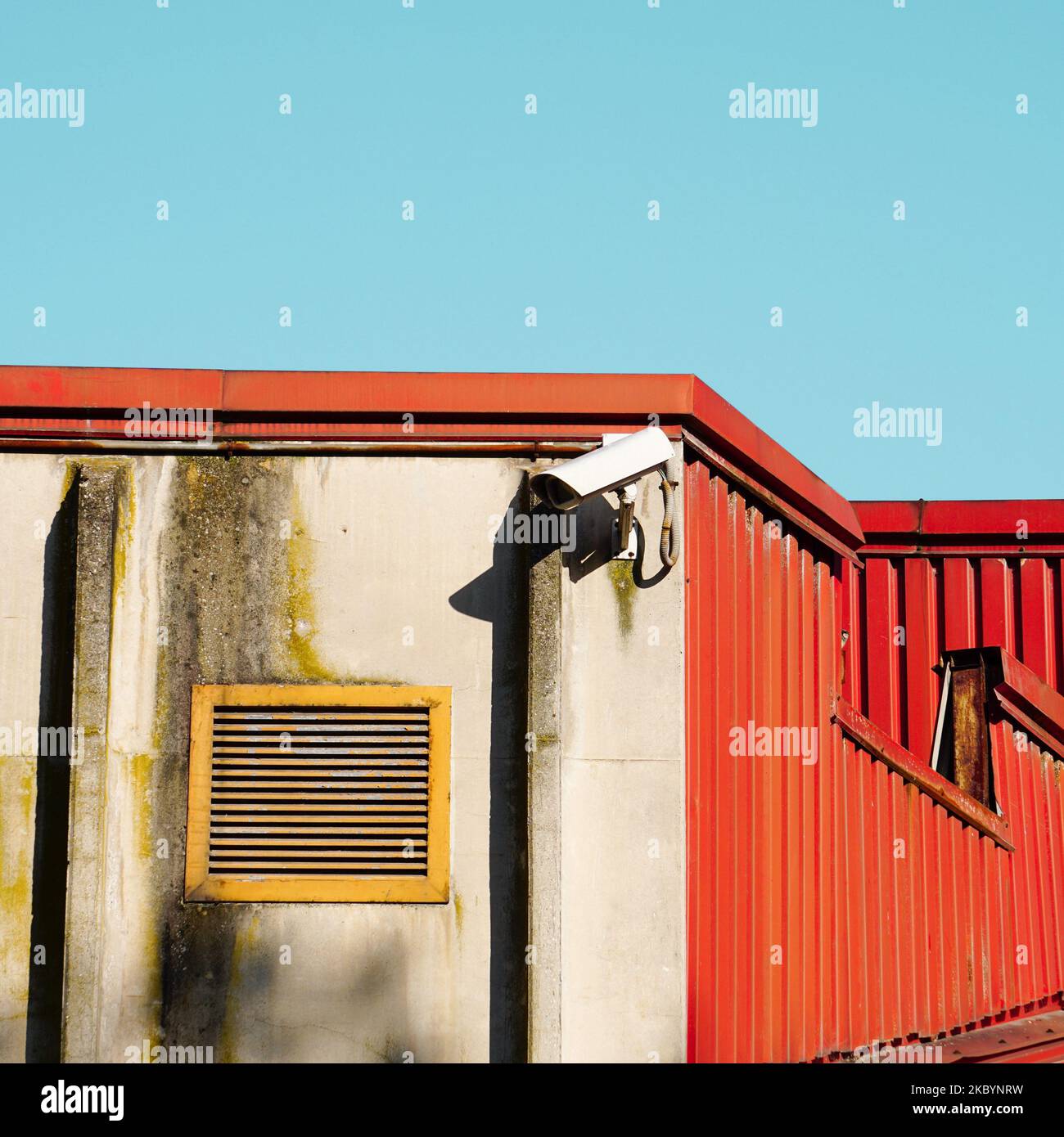 security camera on the building wall Stock Photo - Alamy