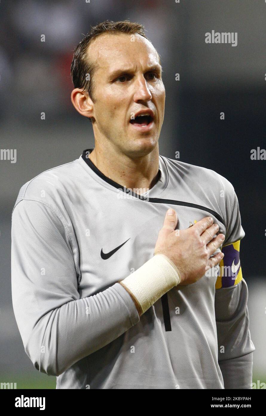 Mark Schwarzer of Australia stands before the international friendly ...