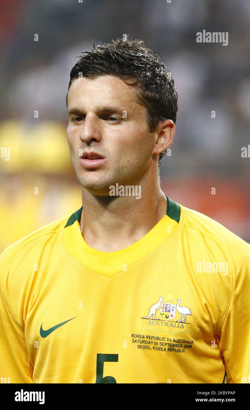 Jason Culina of Australia stands before the international friendly ...