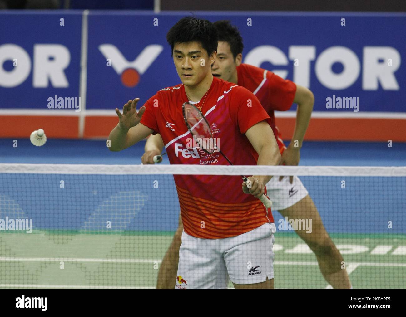South Korea's Lee Yong Dae and Jung Jae Sung compete with China's Cai ...