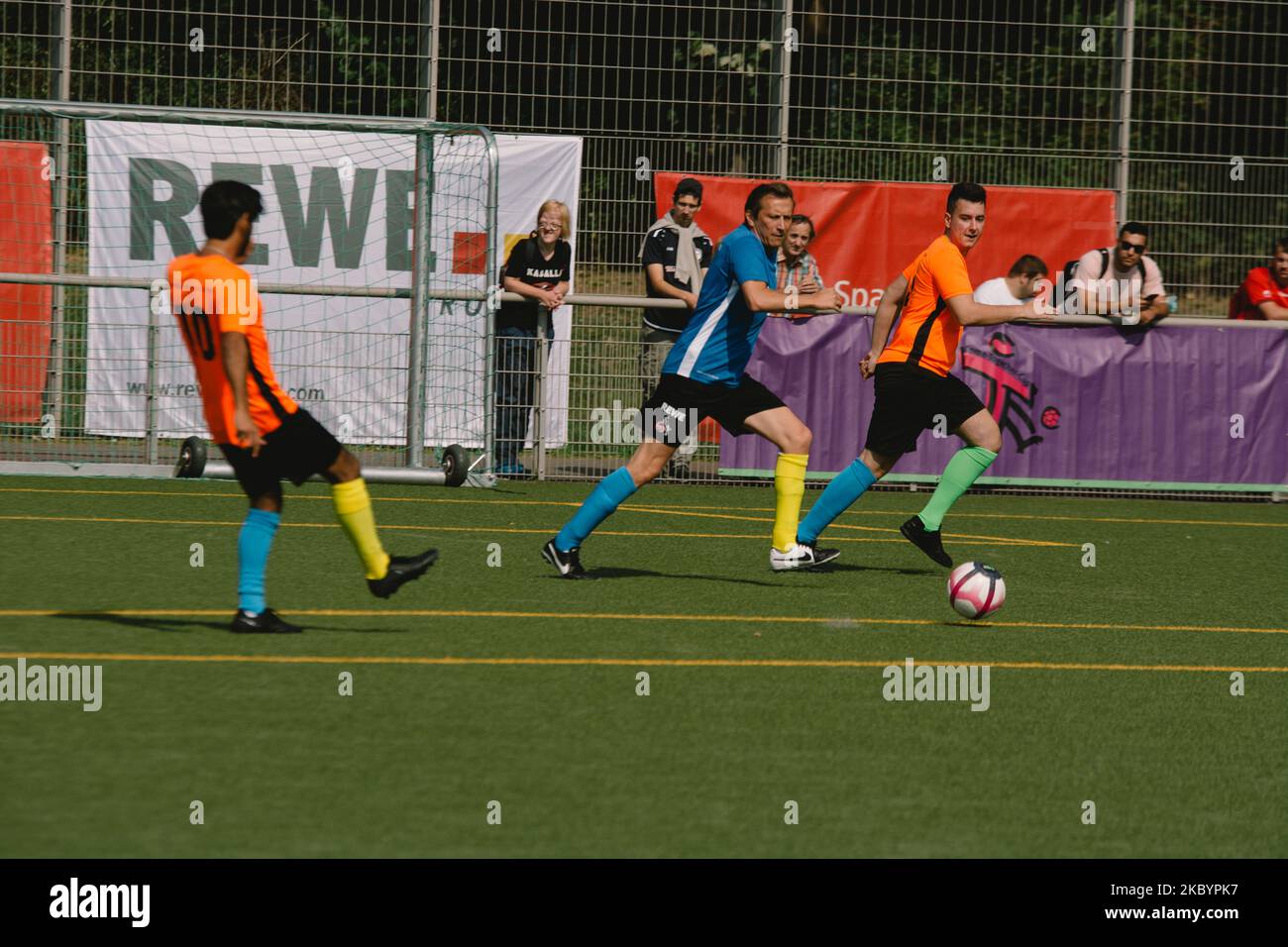 Lionel Souque, Chief Executive of the REWE Group, passes the ball in ...
