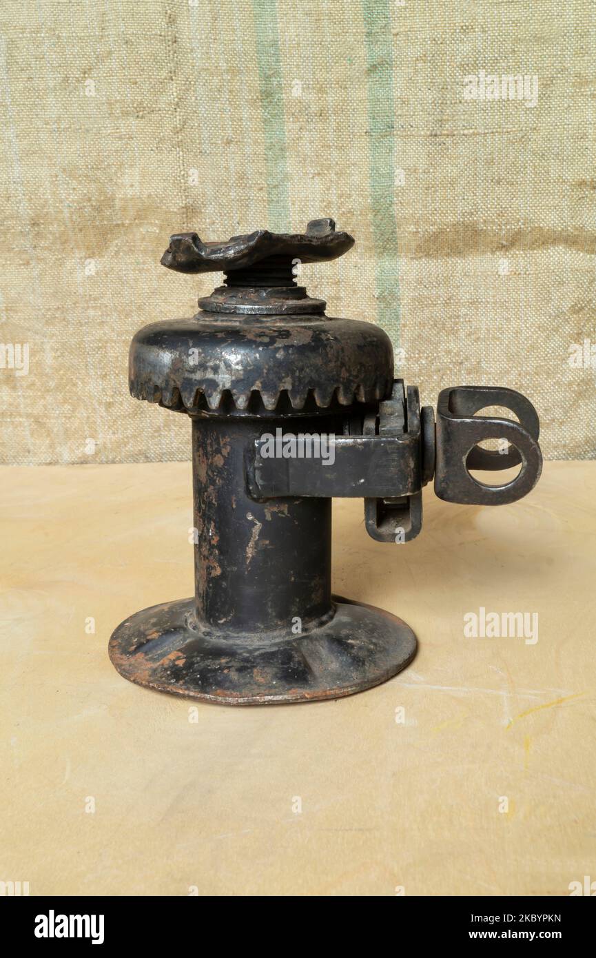 An iron tool for car repair. Industrial steel parts close-up. Device ...