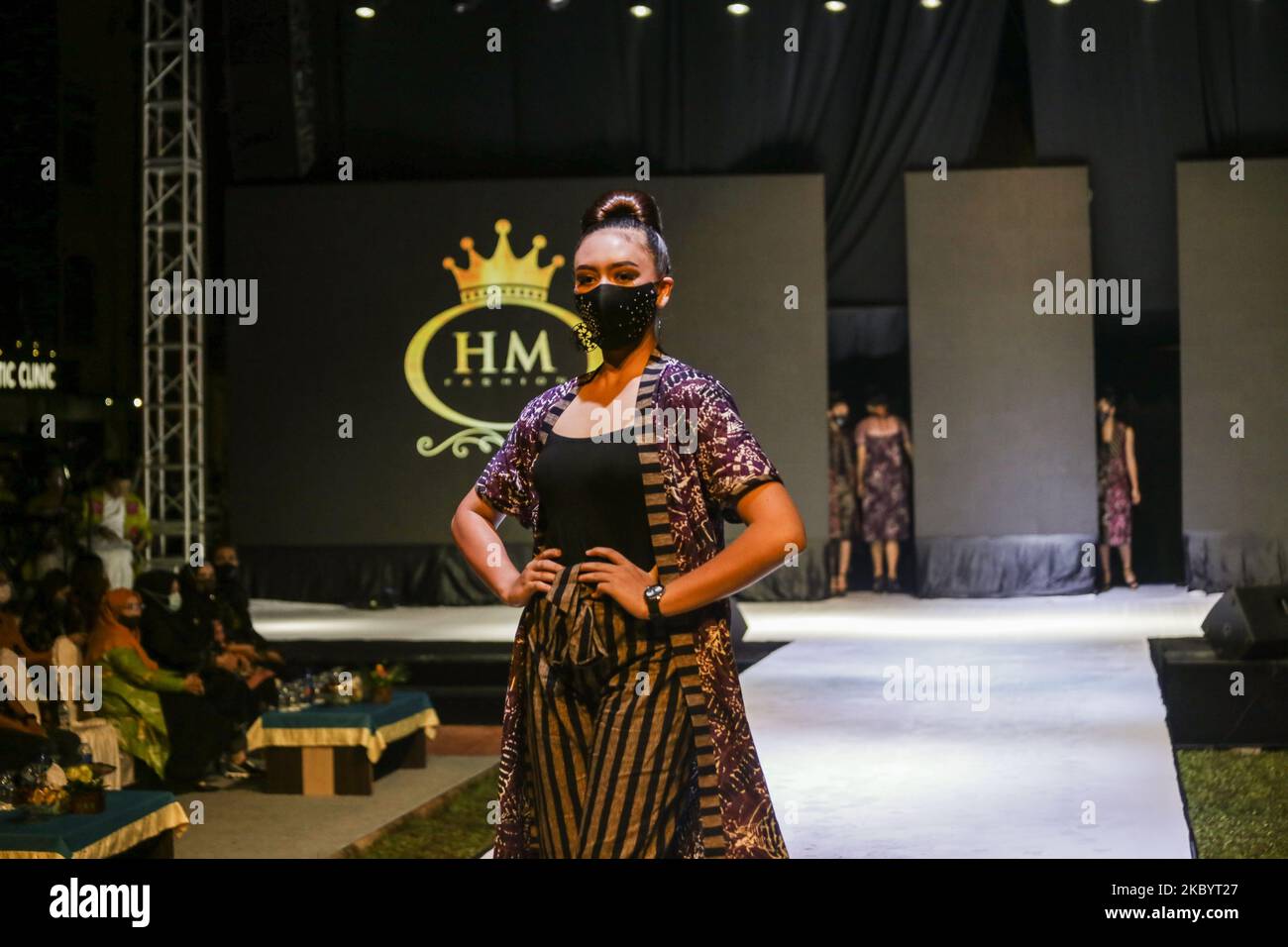 The model wore a marlin fish batik motif designed by a local designer ...
