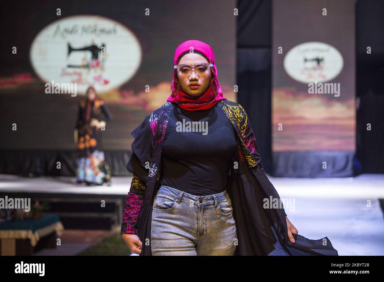 The model wore a marlin fish batik motif designed by a local designer ...
