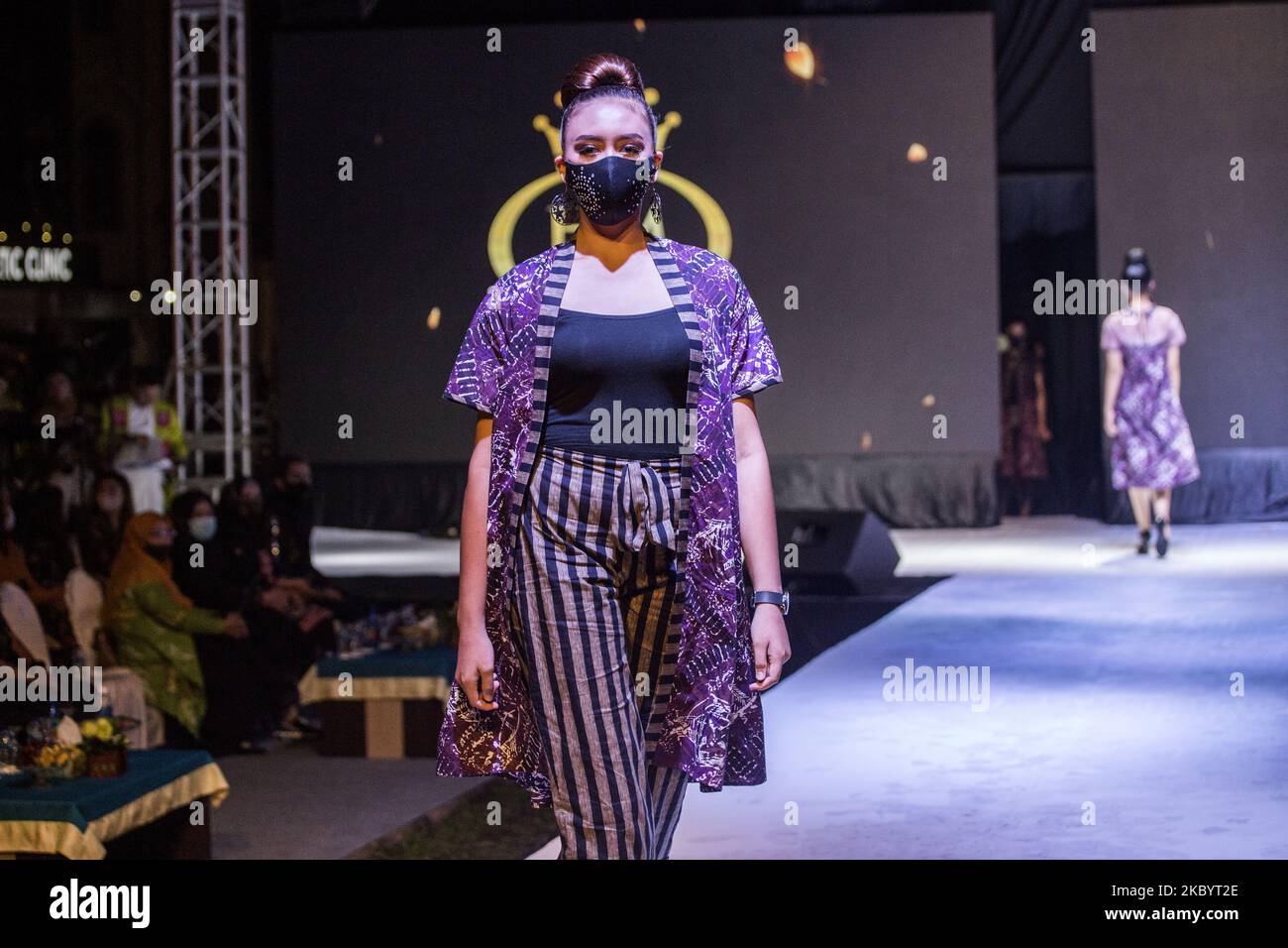 The model wore a marlin fish batik motif designed by a local designer ...