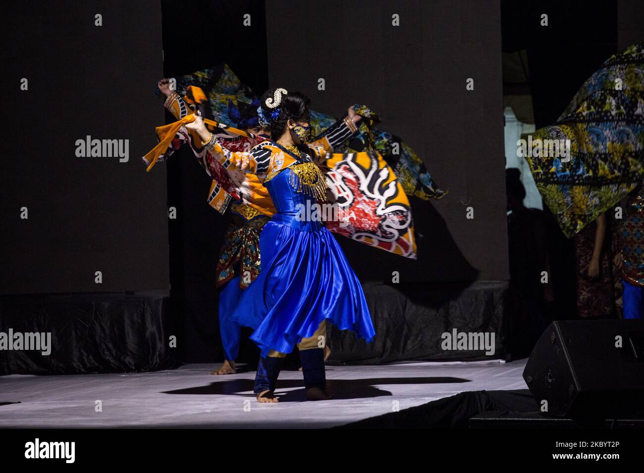 The model wore a marlin fish batik motif designed by a local designer ...