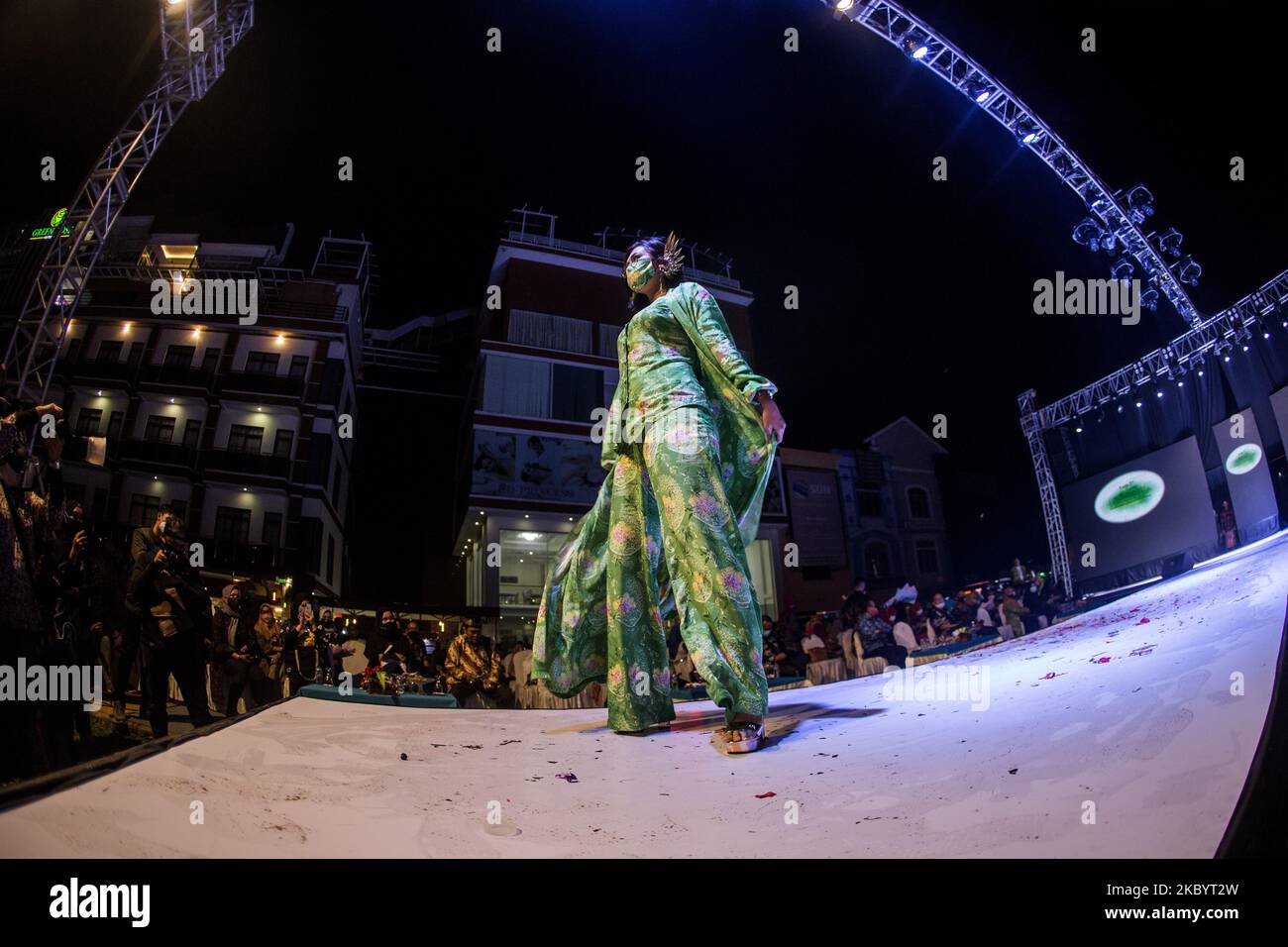 The model wore a marlin fish batik motif designed by a local designer ...