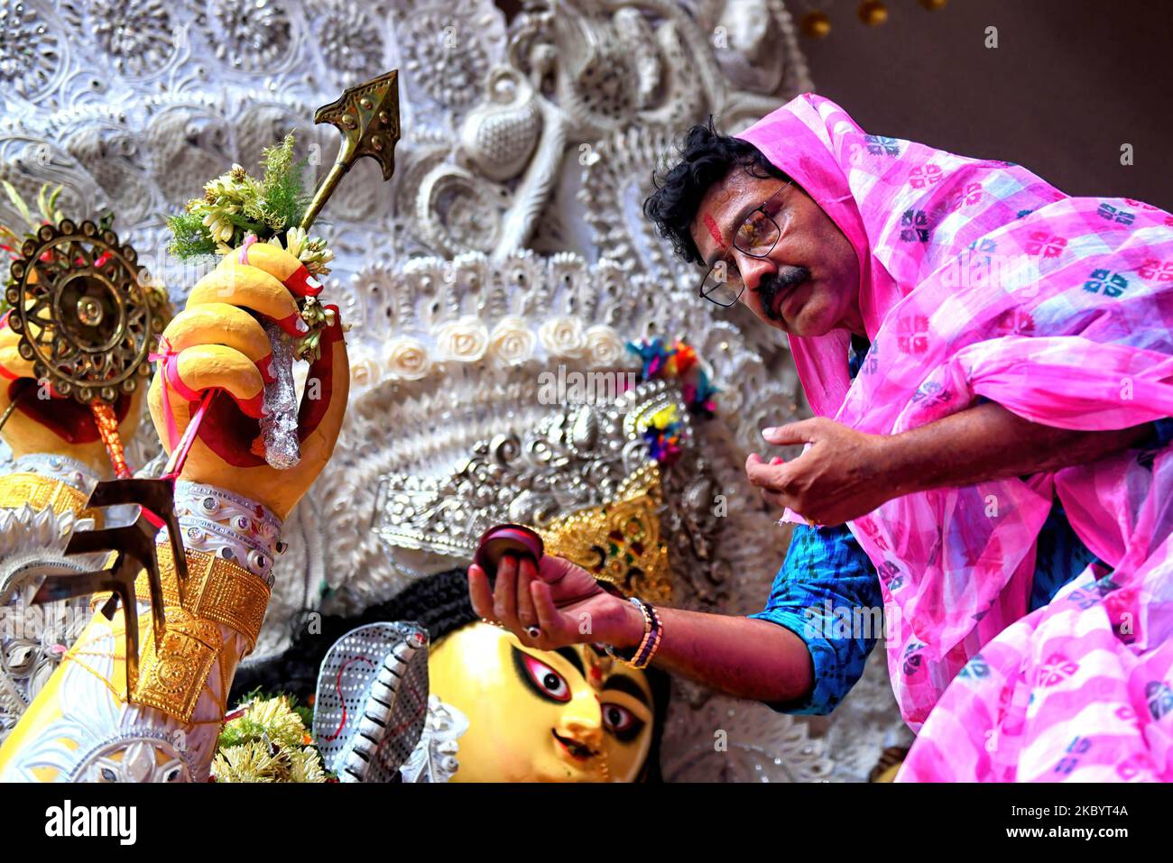 A Hindu man seen dressed as a woman (saree) performs the final worship ...