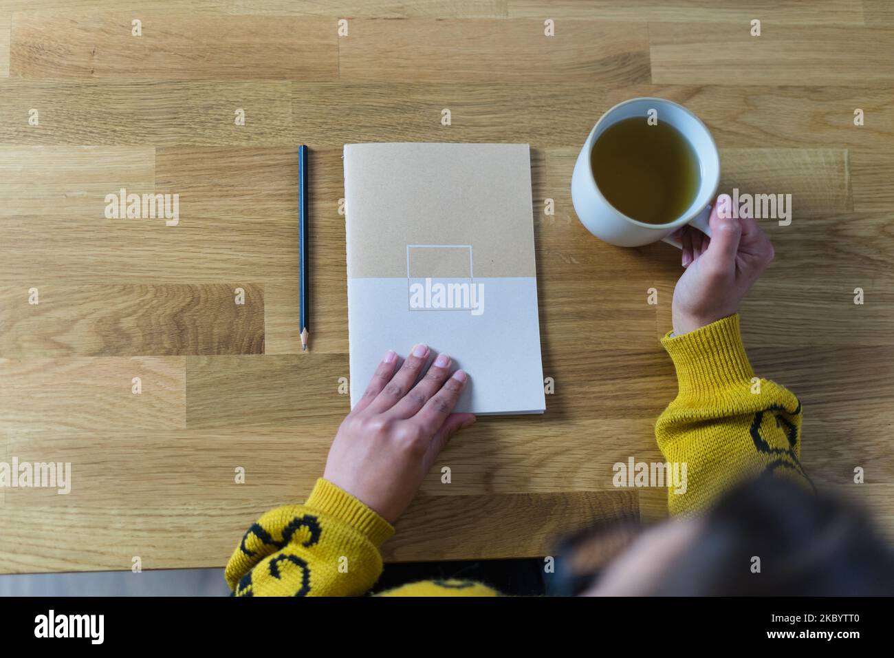Student girl opening notebook table hi-res stock photography and images ...