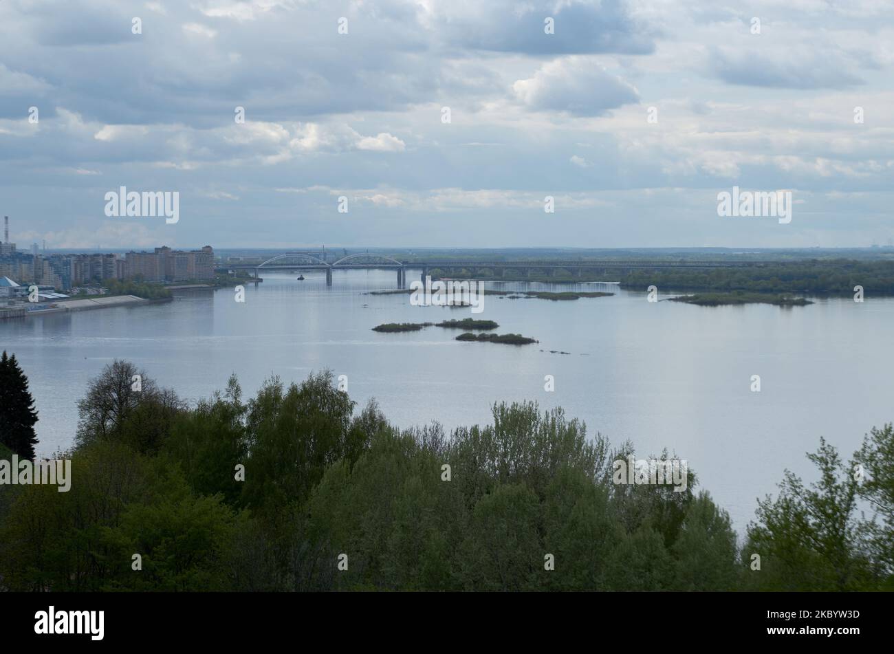 River water landscape. Steel bridge and city on the background Stock ...
