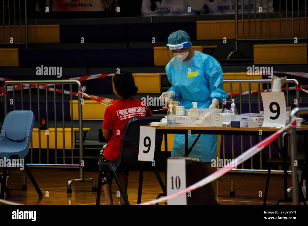 Inside Ta Kok Tsui Sports Centre, one of Hong Kong's makeshift centres ...