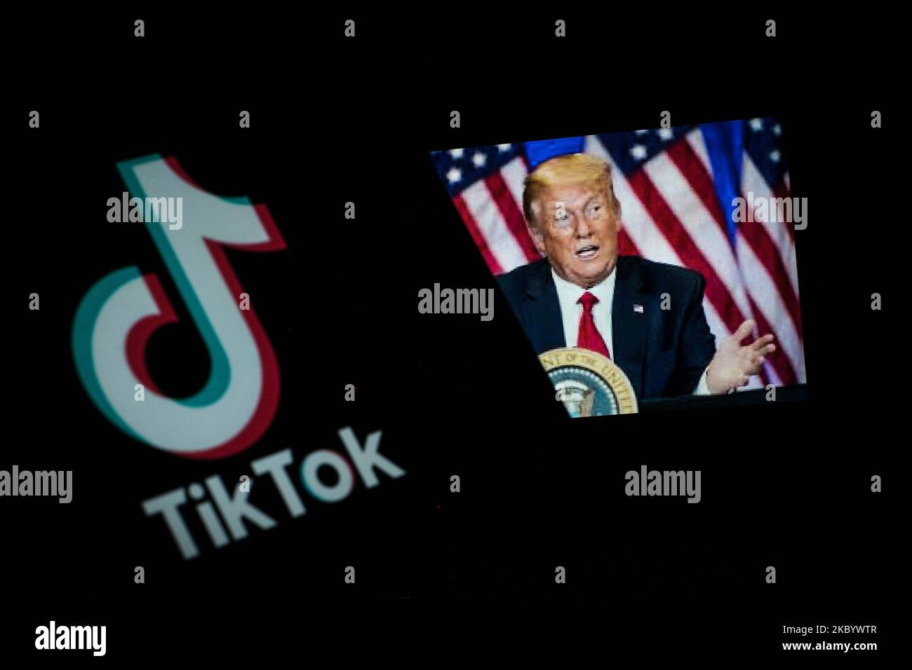 A close-up shows the TikTok sharing application on a smartphone and ...