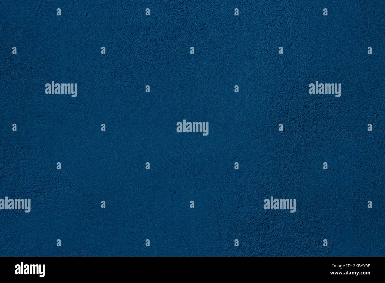 Blue colored abstract wall background with textures of different shades ...