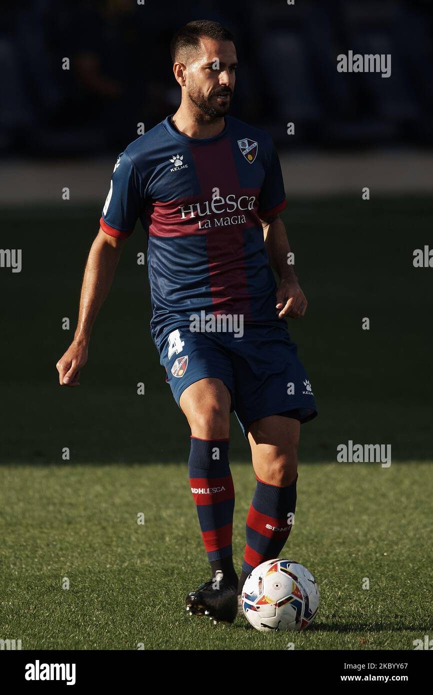 Pablo Insua of Huesca does passed during the La Liga Santader match ...