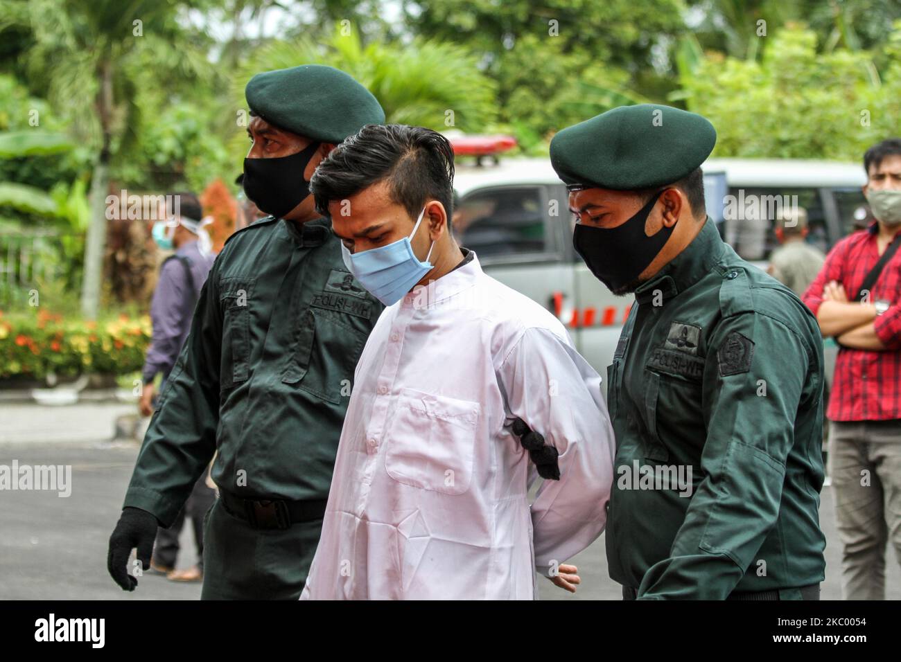 Male sharia lawbreakers hi-res stock photography and images - Alamy