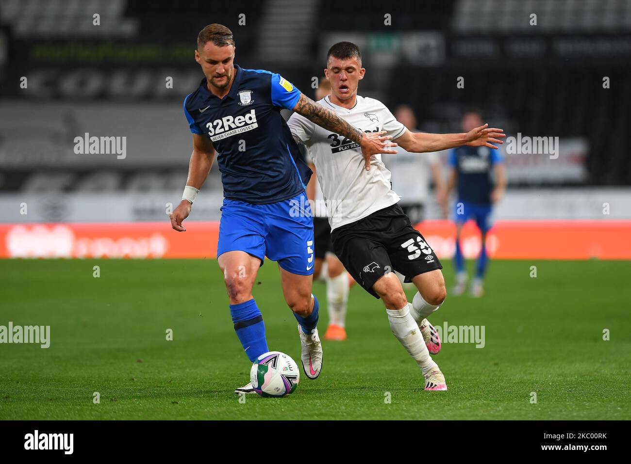 Patrick Bauer of Preston holds off Jason Knight of Derby County during ...