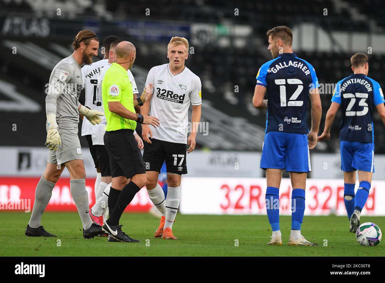Referee Jarred Gillett has words with Louie Sibley of Derby County and ...
