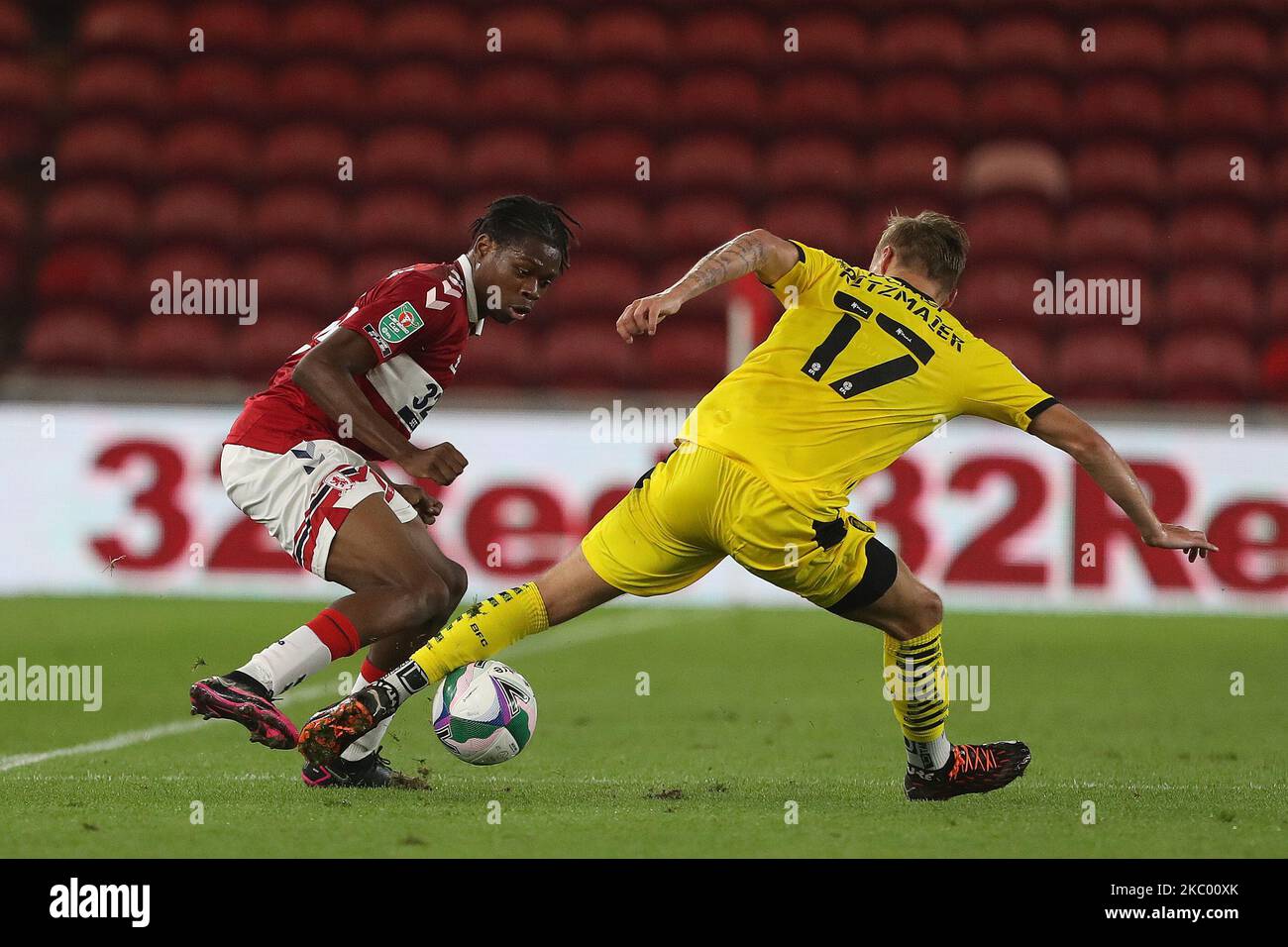 Middlesbrough's Sam Folarin in action dwith Barnsley's Marcel Ritzmaier ...