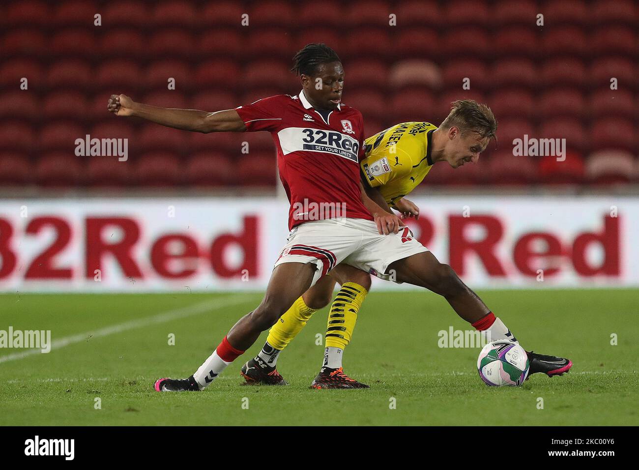 Middlesbrough's Sam Folarin in action dwith Barnsley's Marcel Ritzmaier ...
