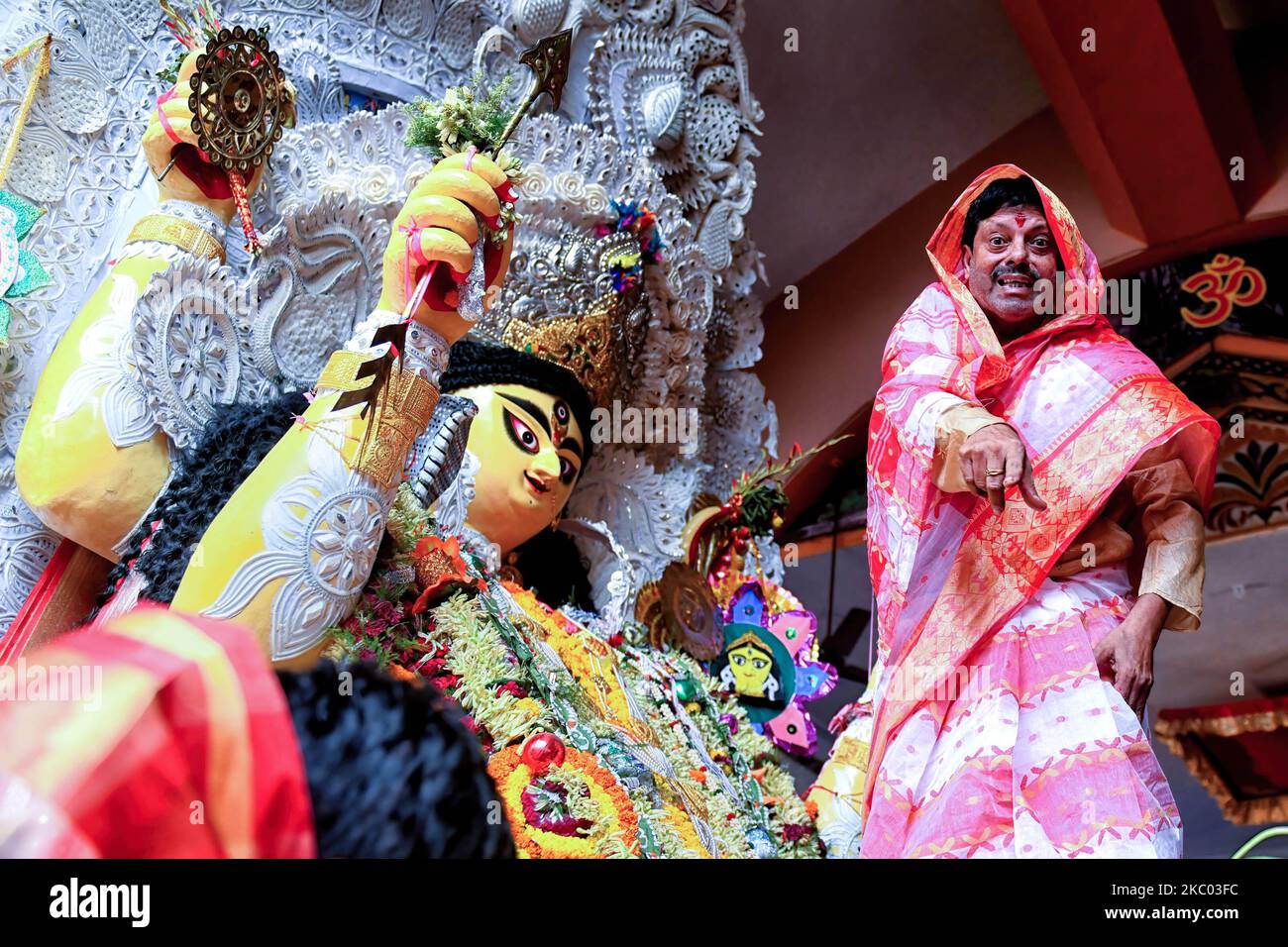 A Hindu man dressed up as a woman (wearing saree) performs the final ...