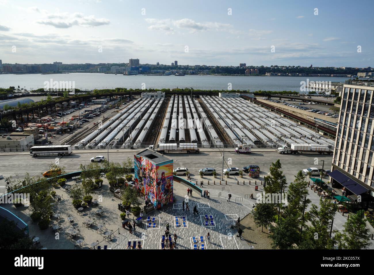 A view of people enjoying the Hudson Yards’ Backyard Big Screen curated ...