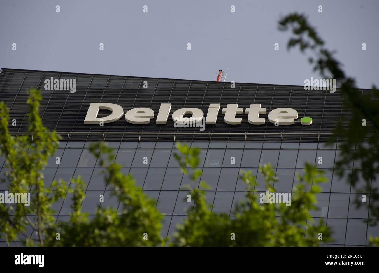 Multinational professional services network company Deloitte sign is ...