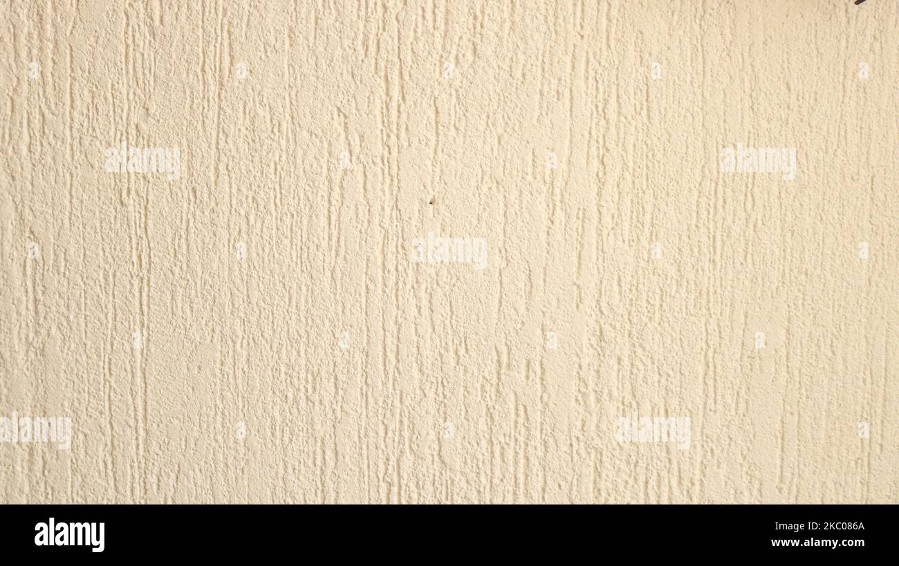 A beige concrete wall texture, perfect of backgrounds and overlays Stock Photo - Alamy