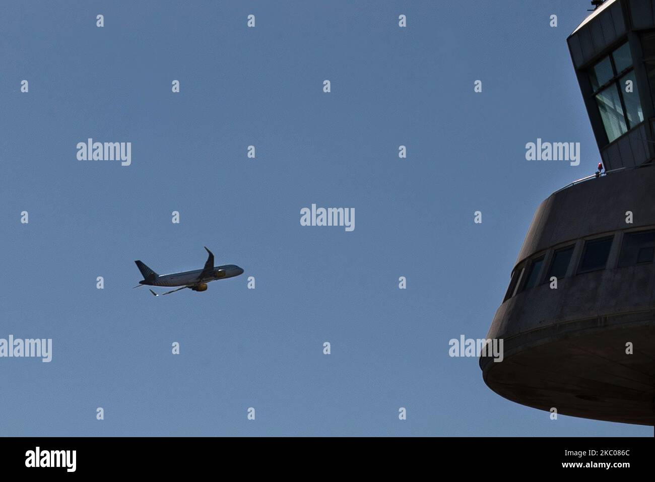 A plane leaves Barcelona airport, El Prat, after the closure of the ...