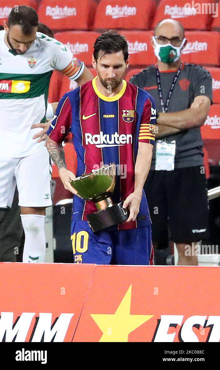 Leo Messi with the Joan Gamper Trophy at the end of the match between ...