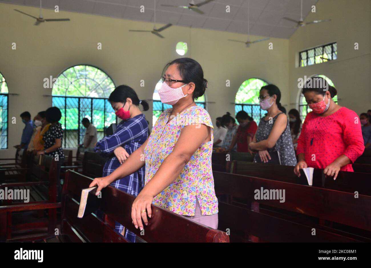 Worshiper wearing mask hi-res stock photography and images - Alamy