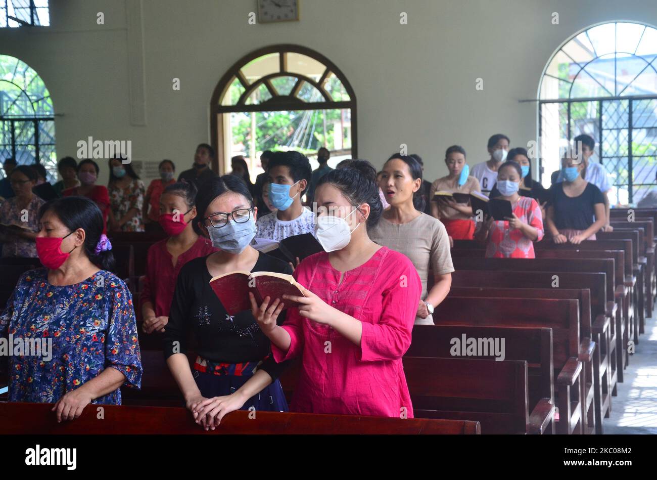 Worshiper wearing mask hi-res stock photography and images - Alamy