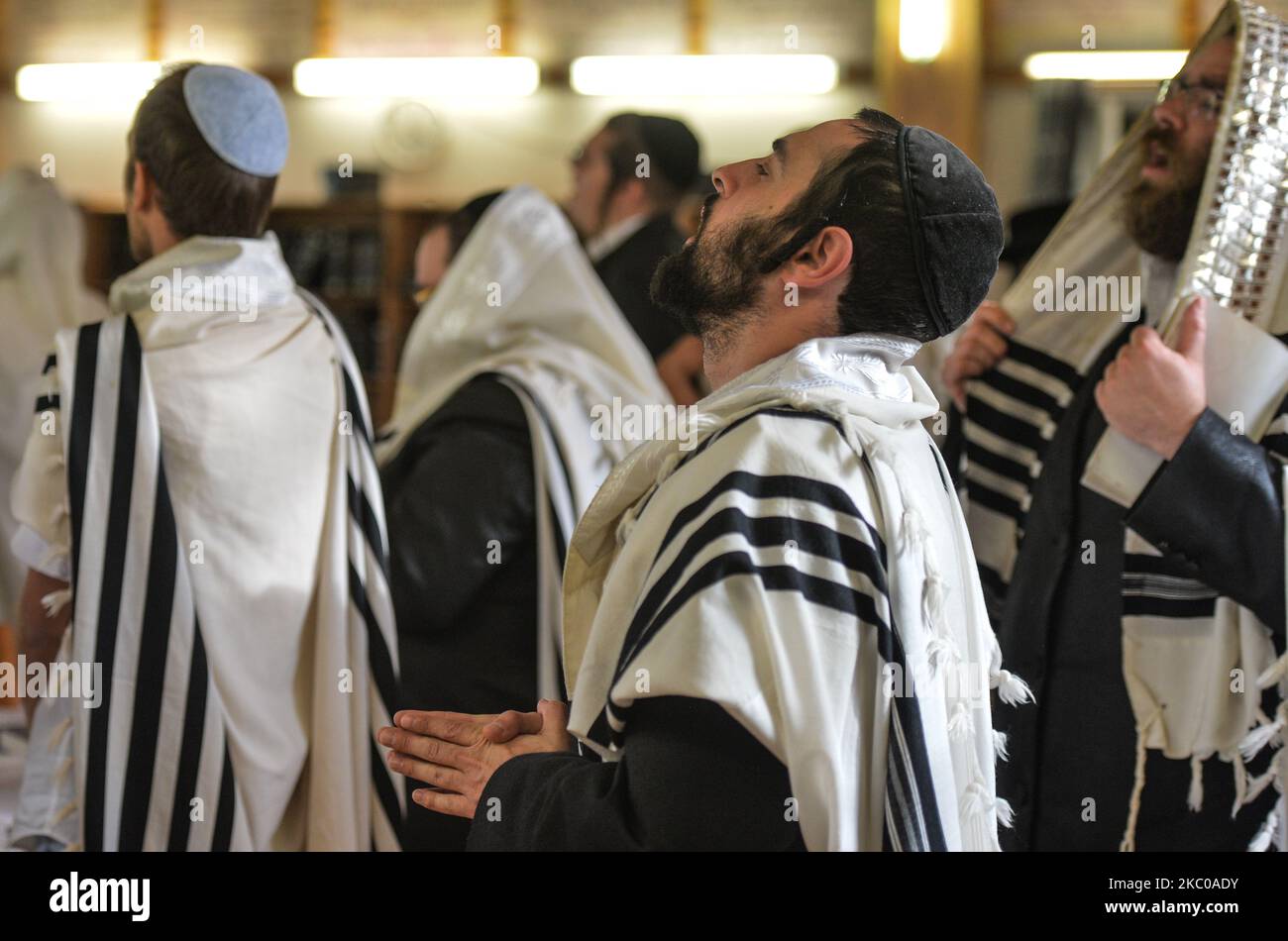 A group of Orthodox Jews praying on the last day of Rosh Hashanah, the ...