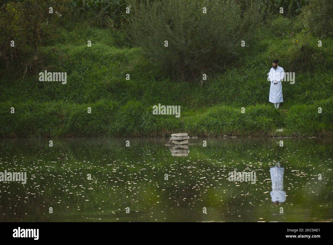 An Orthodox Jew praying on the last day of Rosh Hashanah, the Jewish ...