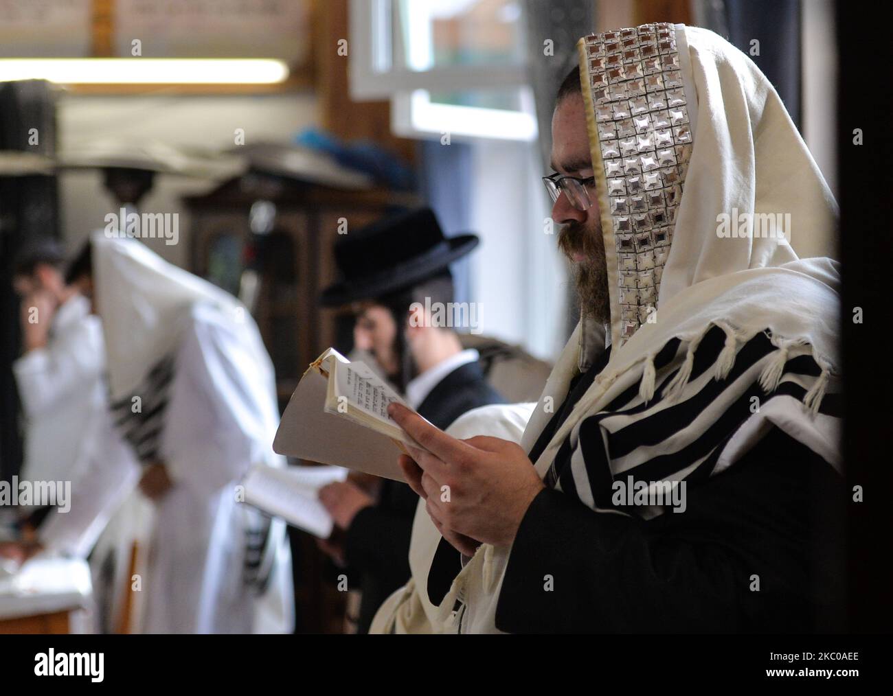 An Orthodox Jew praying on the last day of Rosh Hashanah, the Jewish ...