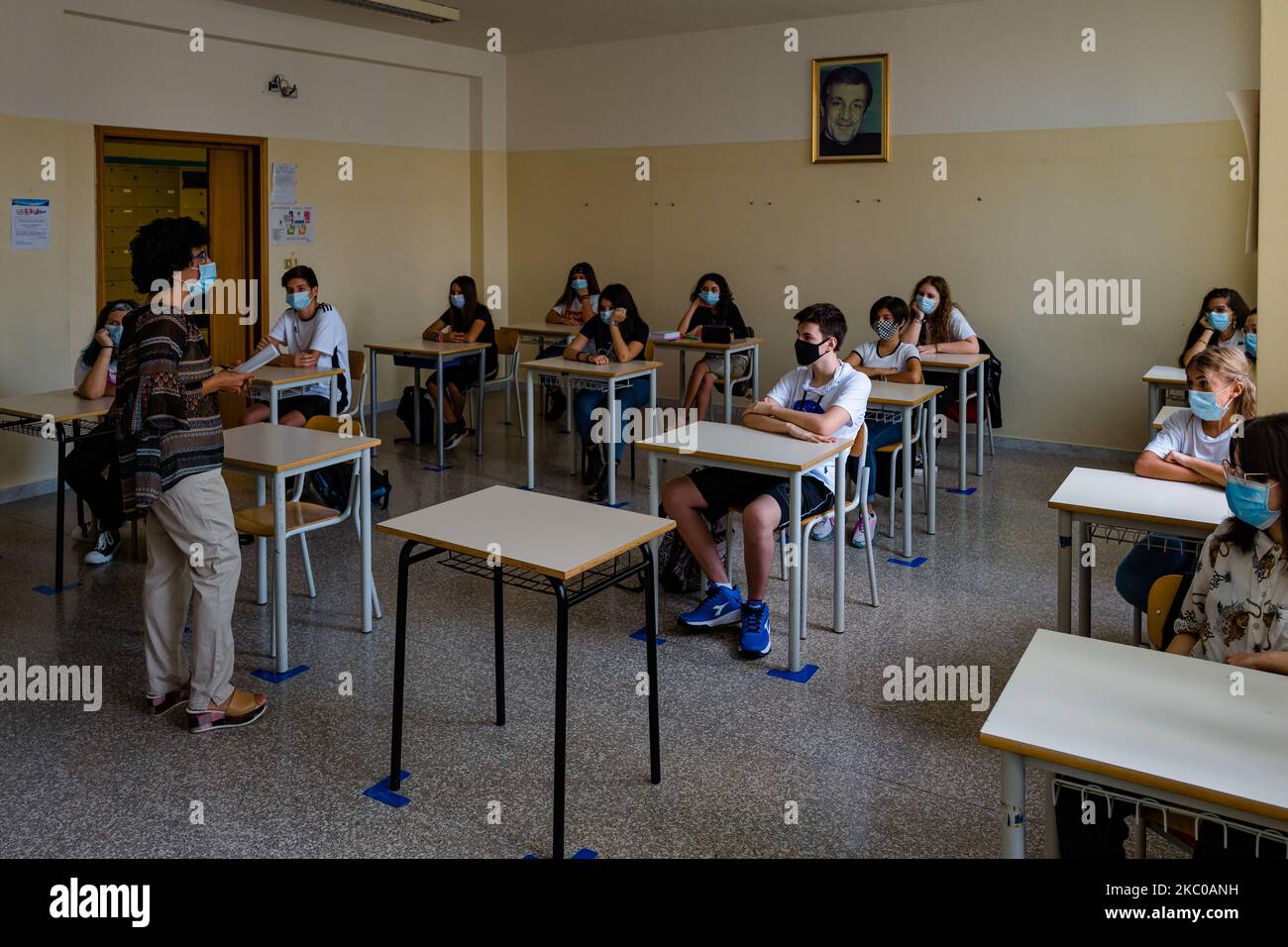 Students inside the classroom, begin their first lesson on the first ...