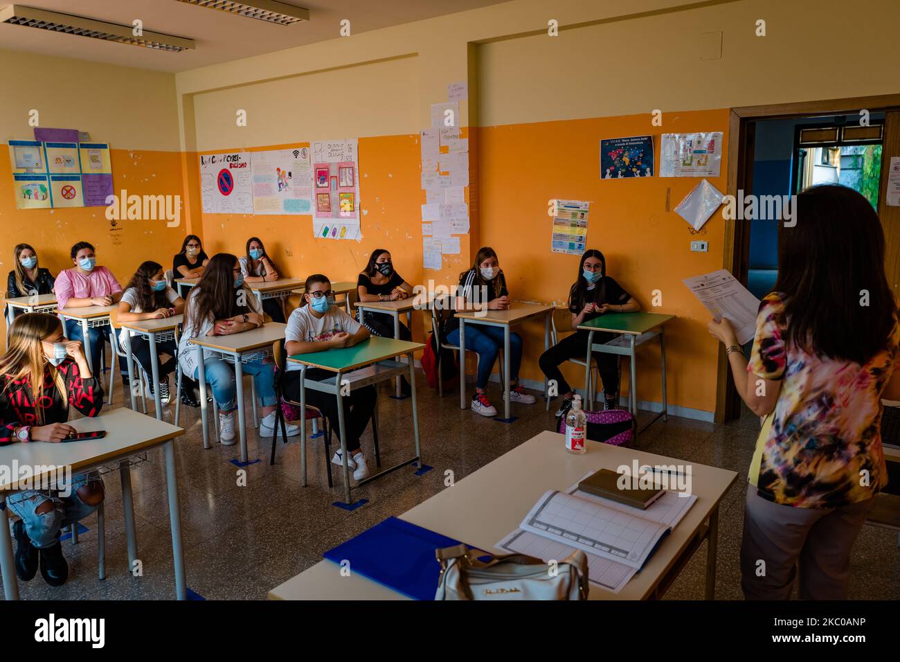 Students inside the classroom, begin their first lesson on the first ...