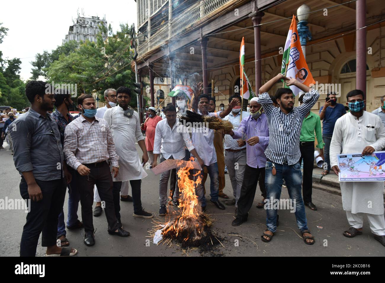 Effigy of Narendra Modi was set on fire during an agitation by the ...