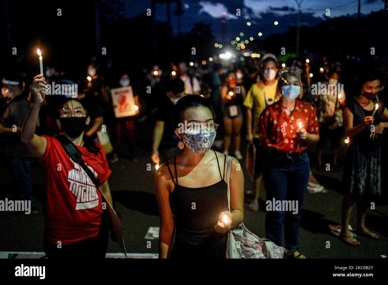 Activists light candles during the 48th anniversary of the Martial Law ...
