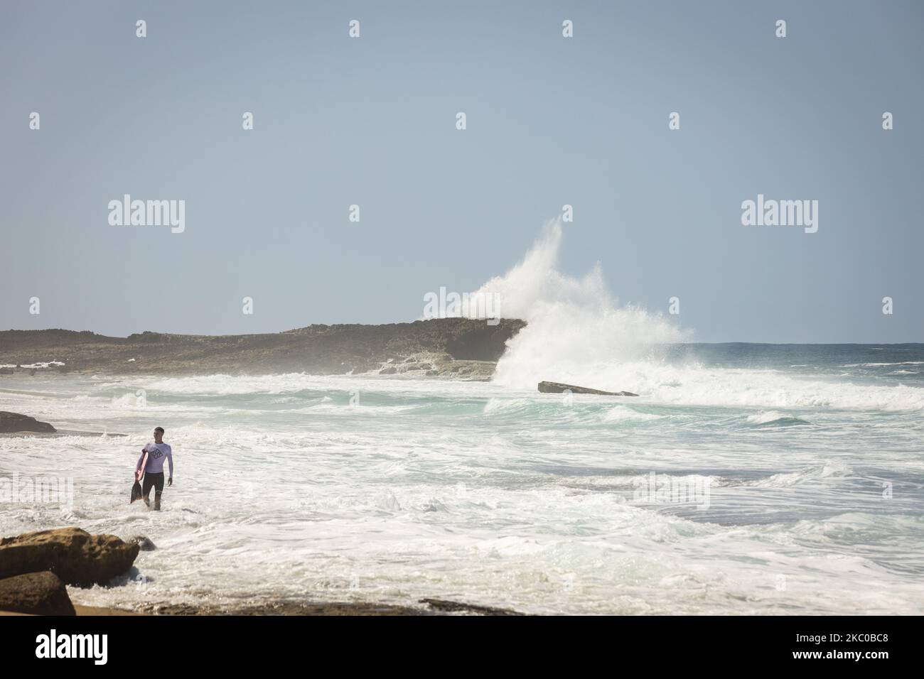 People practice surf in Isabela, Puerto Rico, on September 20, 2020 ...