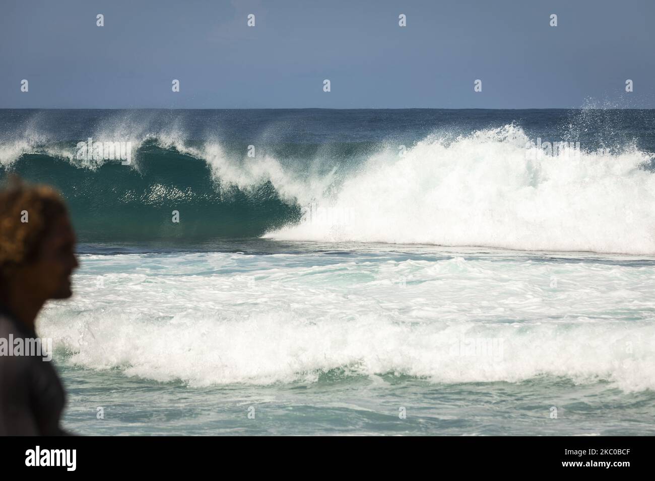 People practice surf in Isabela, Puerto Rico, on September 20, 2020 ...