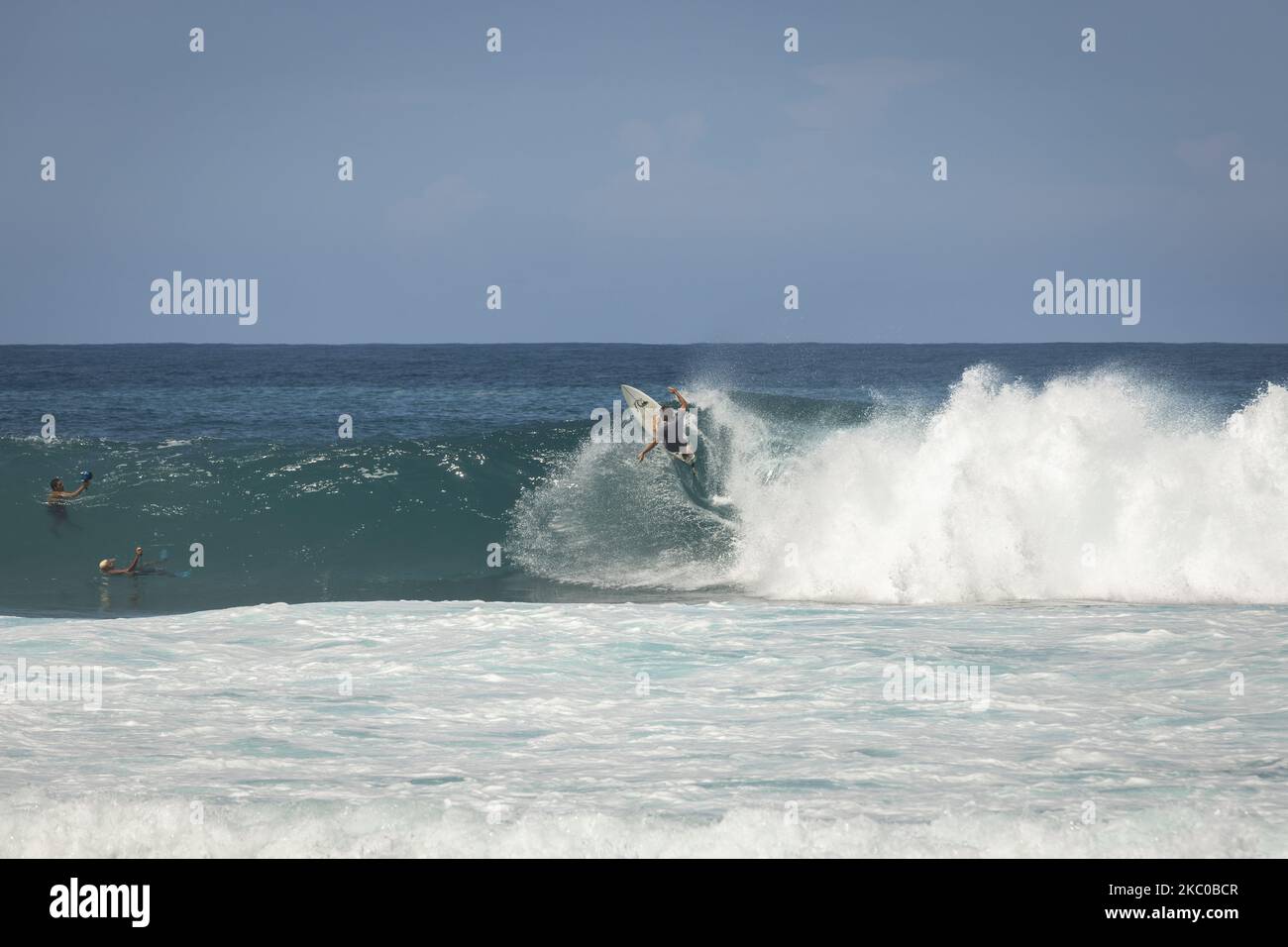 People practice surf in Isabela, Puerto Rico, on September 20, 2020 ...