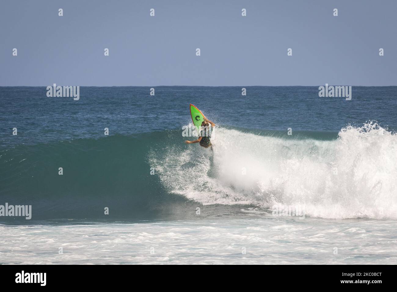 People practice surf in Isabela, Puerto Rico, on September 20, 2020 ...