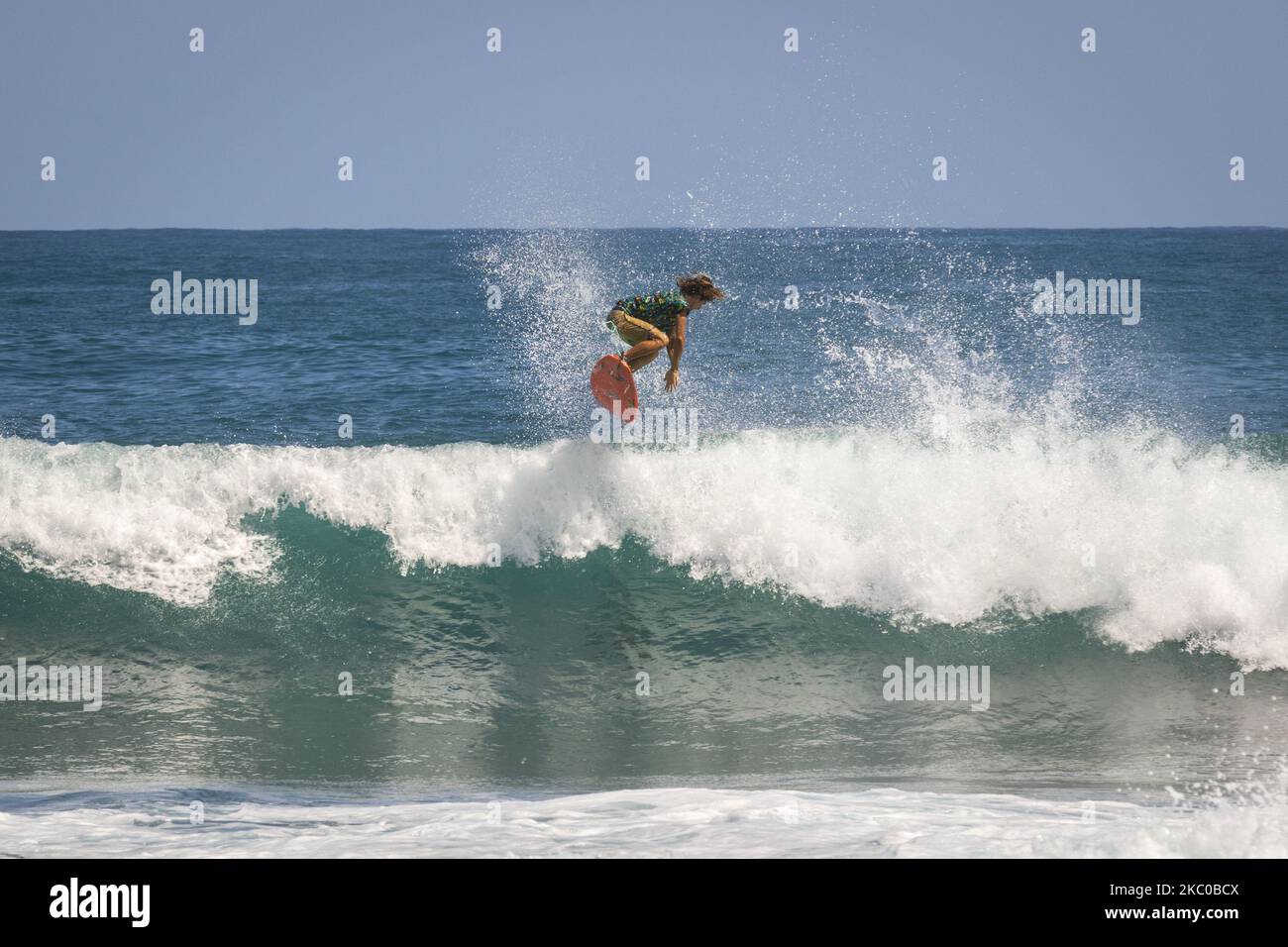 People practice surf in Isabela, Puerto Rico, on September 20, 2020 ...