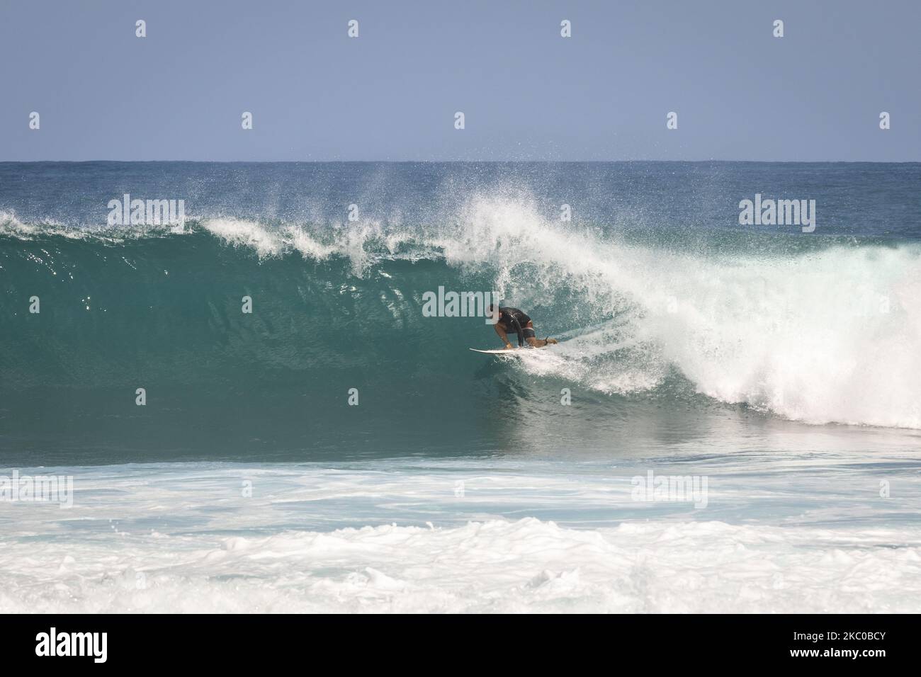 People practice surf in Isabela, Puerto Rico, on September 20, 2020 ...