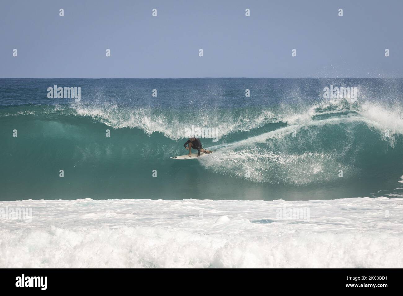People practice surf in Isabela, Puerto Rico, on September 20, 2020 ...