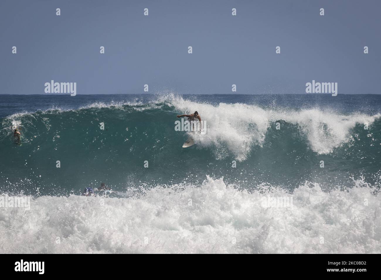 People practice surf in Isabela, Puerto Rico, on September 20, 2020 ...