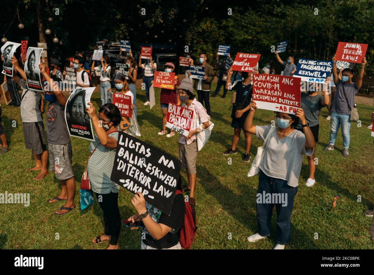 Protesters hold placards during the demonstration. Hundreds of Youth ...