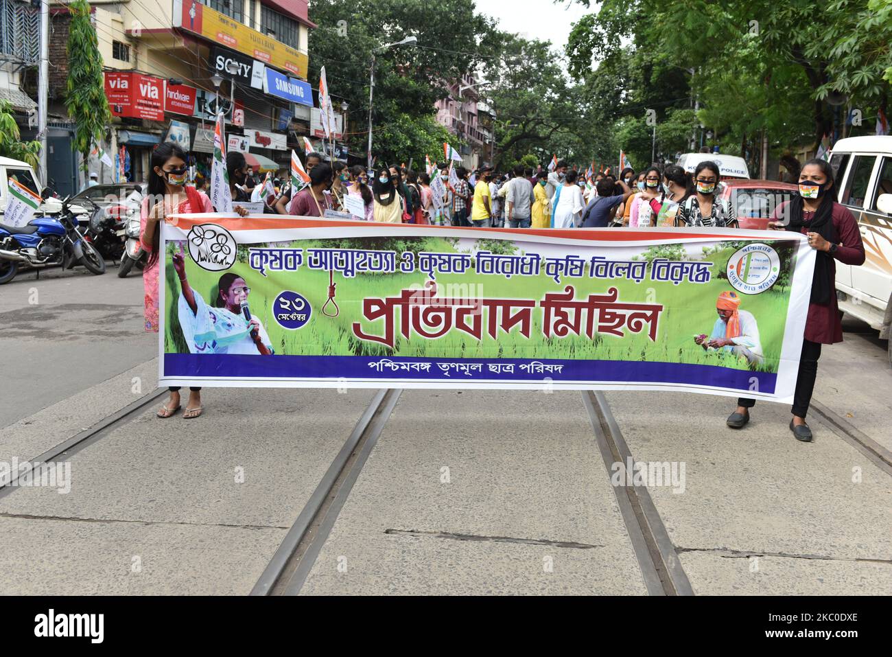 Students with a protest banner during the rally. In Kolkata, India, on ...